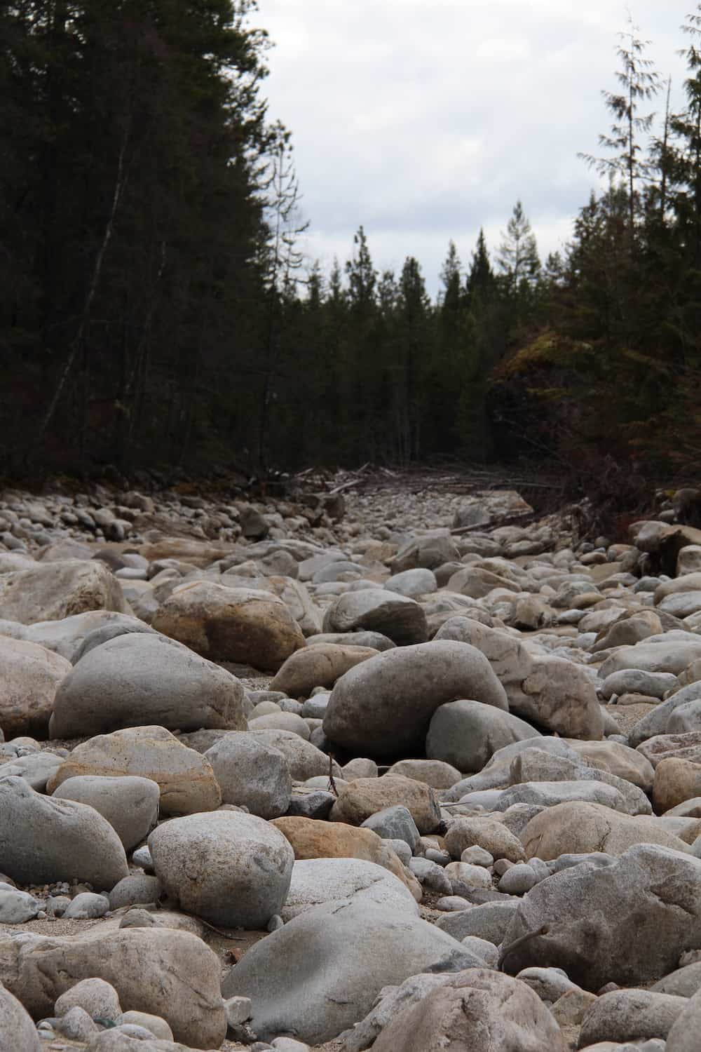 Giant river rocks in streambed – Home for the Harvest